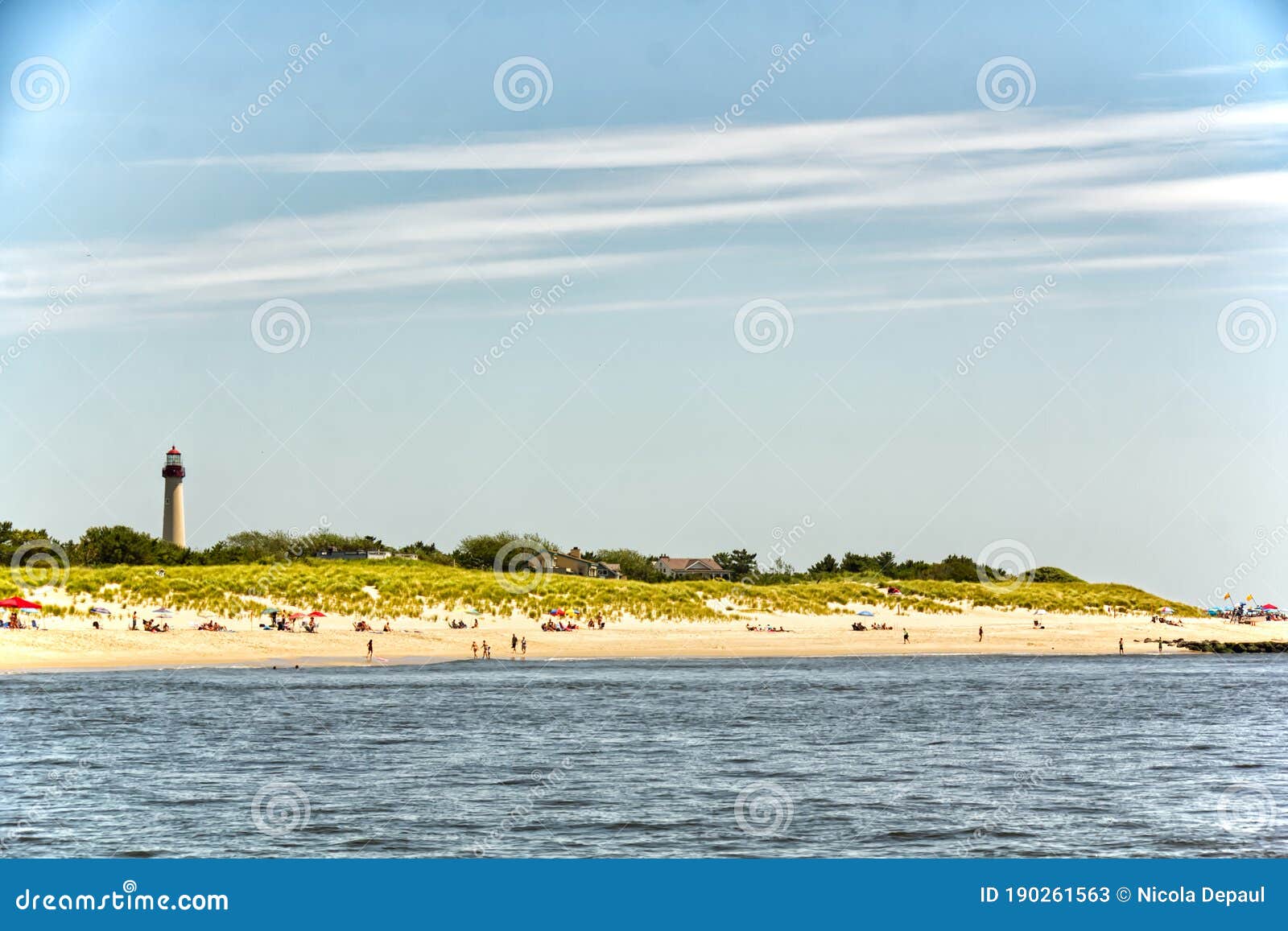 Oceanside with lighthouse stock image. Image of shore - 190261563
