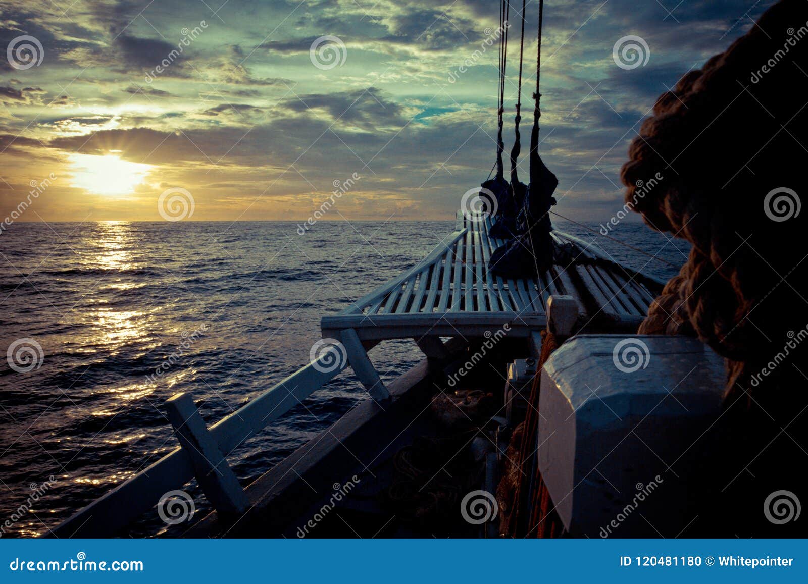 The Ocean View from the Bow of a Sailing Ship on the Beautiful Sunsets ...