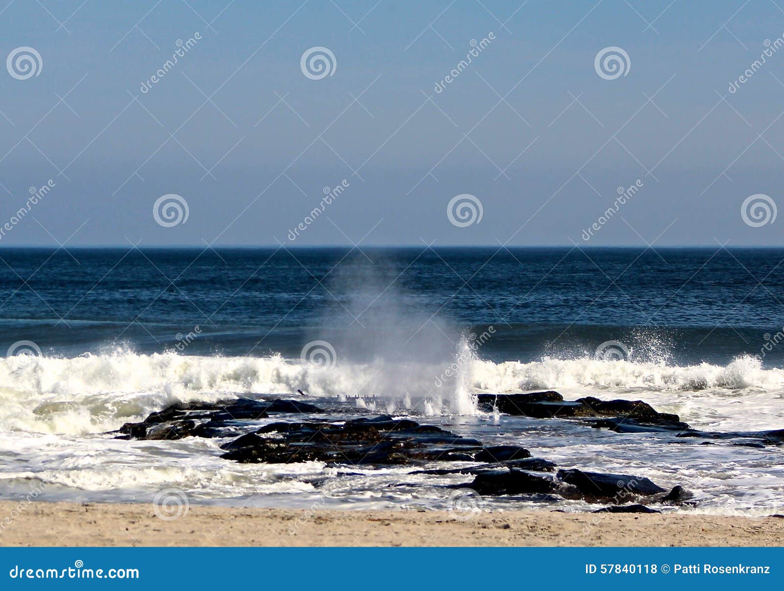 Ocean Wave Breaking Over Jetty Stock Photo - Image of jetty, blue: 57840118