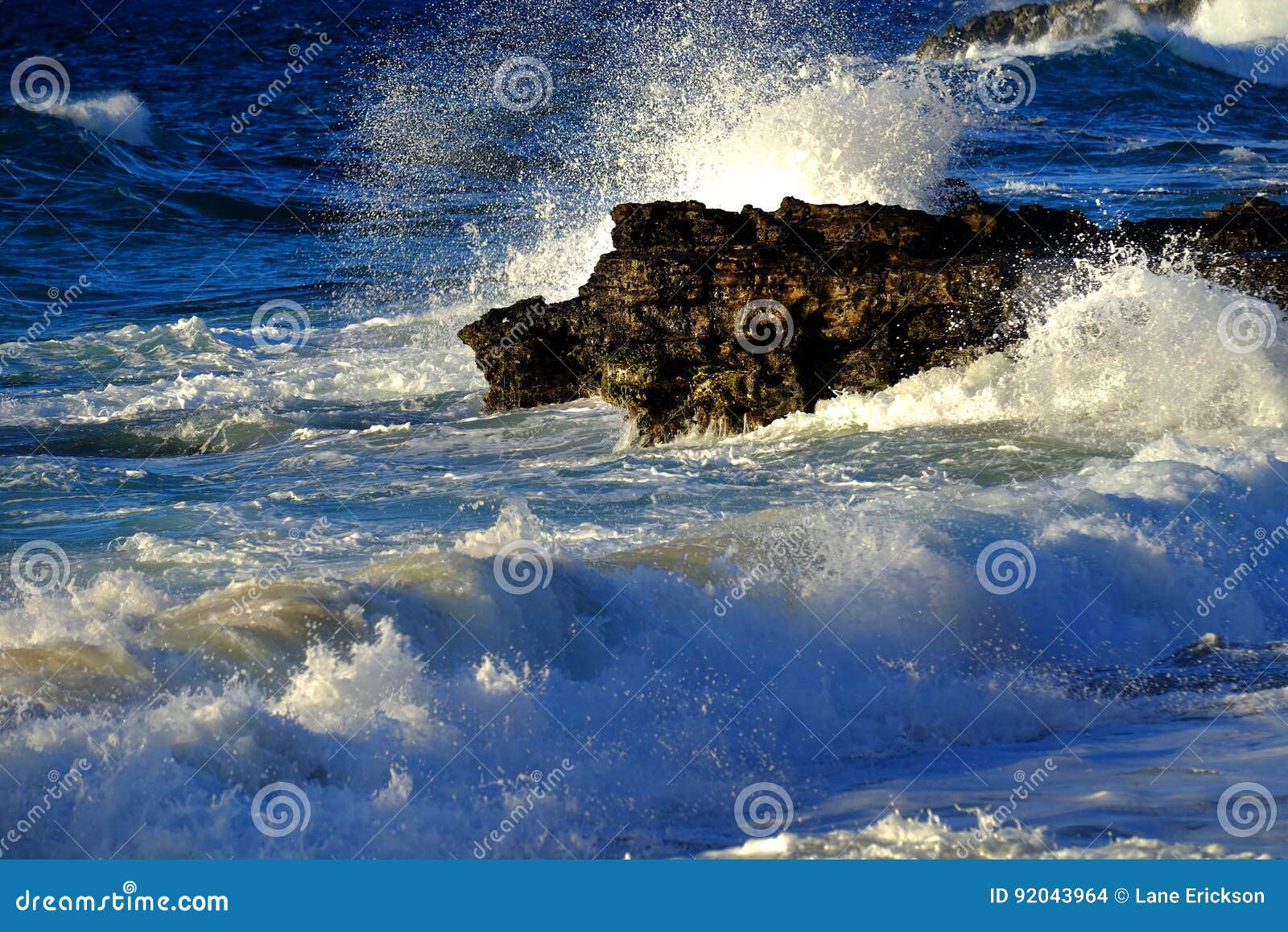 Ocean Wave Rolling Over and Smashing Against Rocks Stock Photo - Image ...