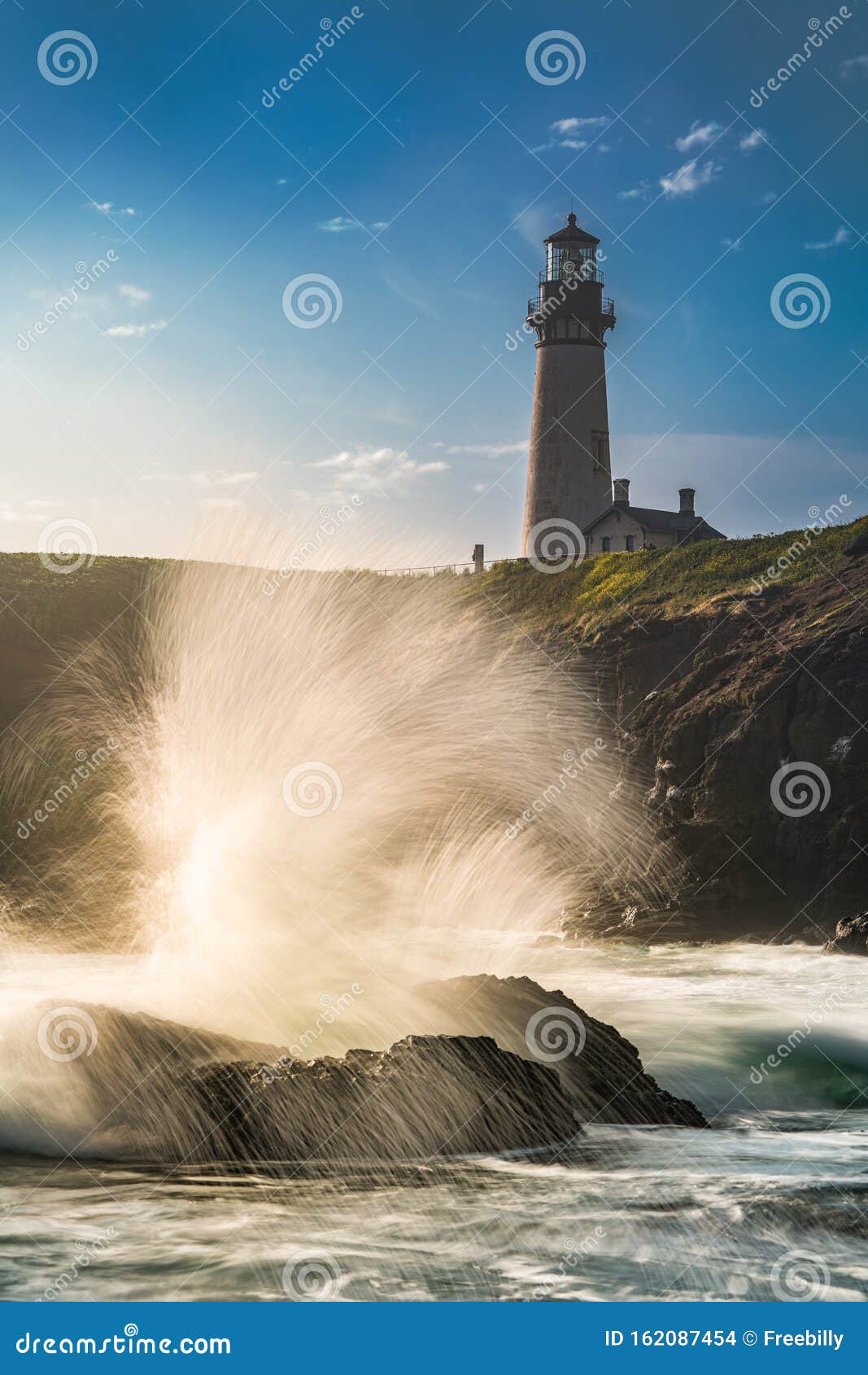 The Ocean Wave Splash and a Lighthouse Stock Photo - Image of landscape ...