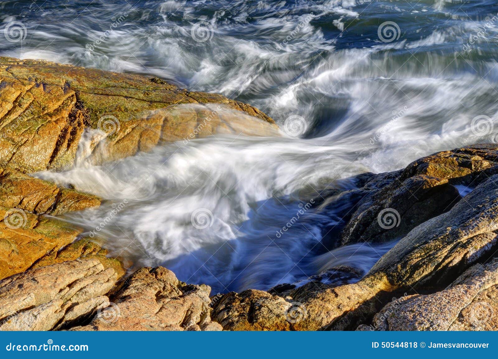 Ocean Wave Splashing Against the Rocks Stock Photo - Image of closeup ...