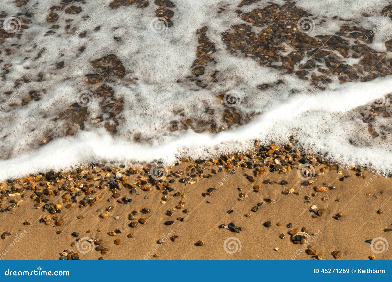 Ocean Wave Washes Over Sand and Pebble Beach Stock Image - Image of ...