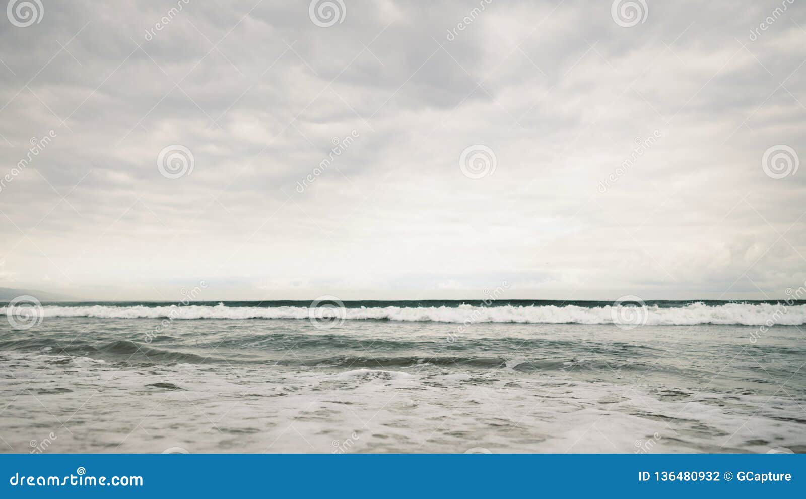 Ocean Waves on Beach in Cloudy Day Stock Photo - Image of cloudy, surf ...