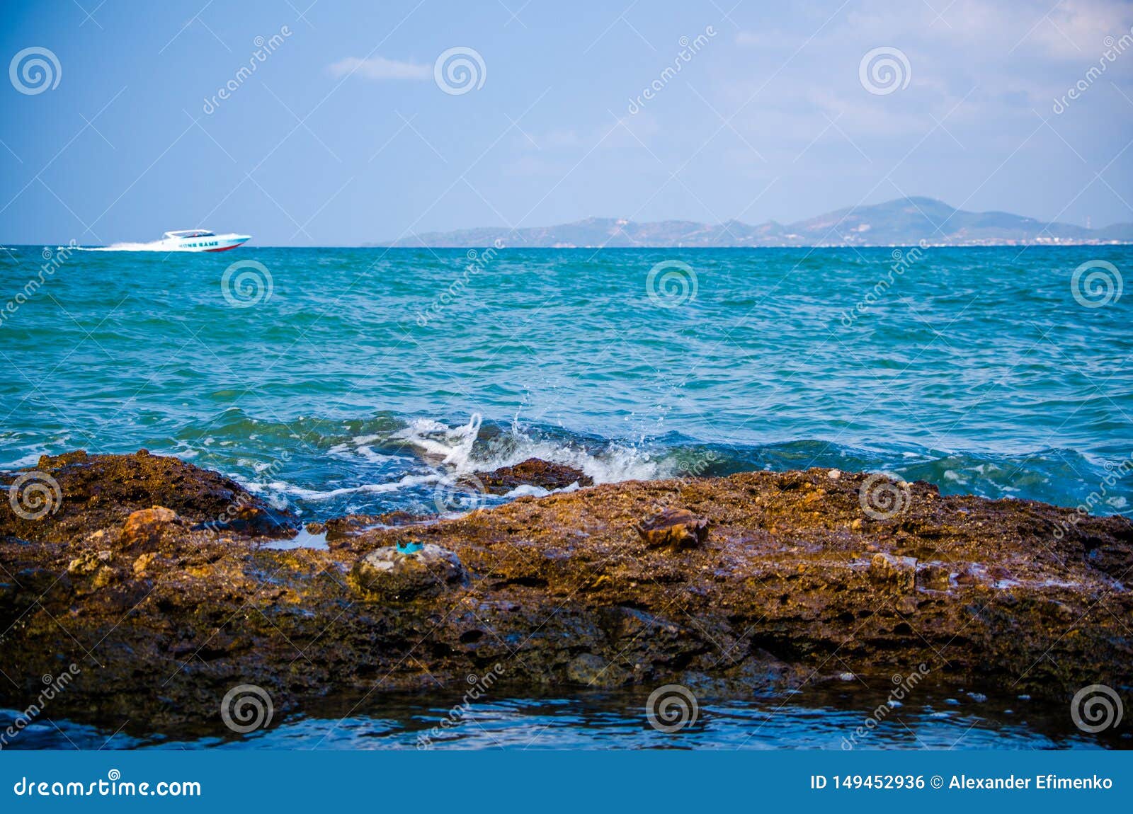 Ocean Waves Breaking on the Rocks on the Shore. Stock Photo - Image of ...