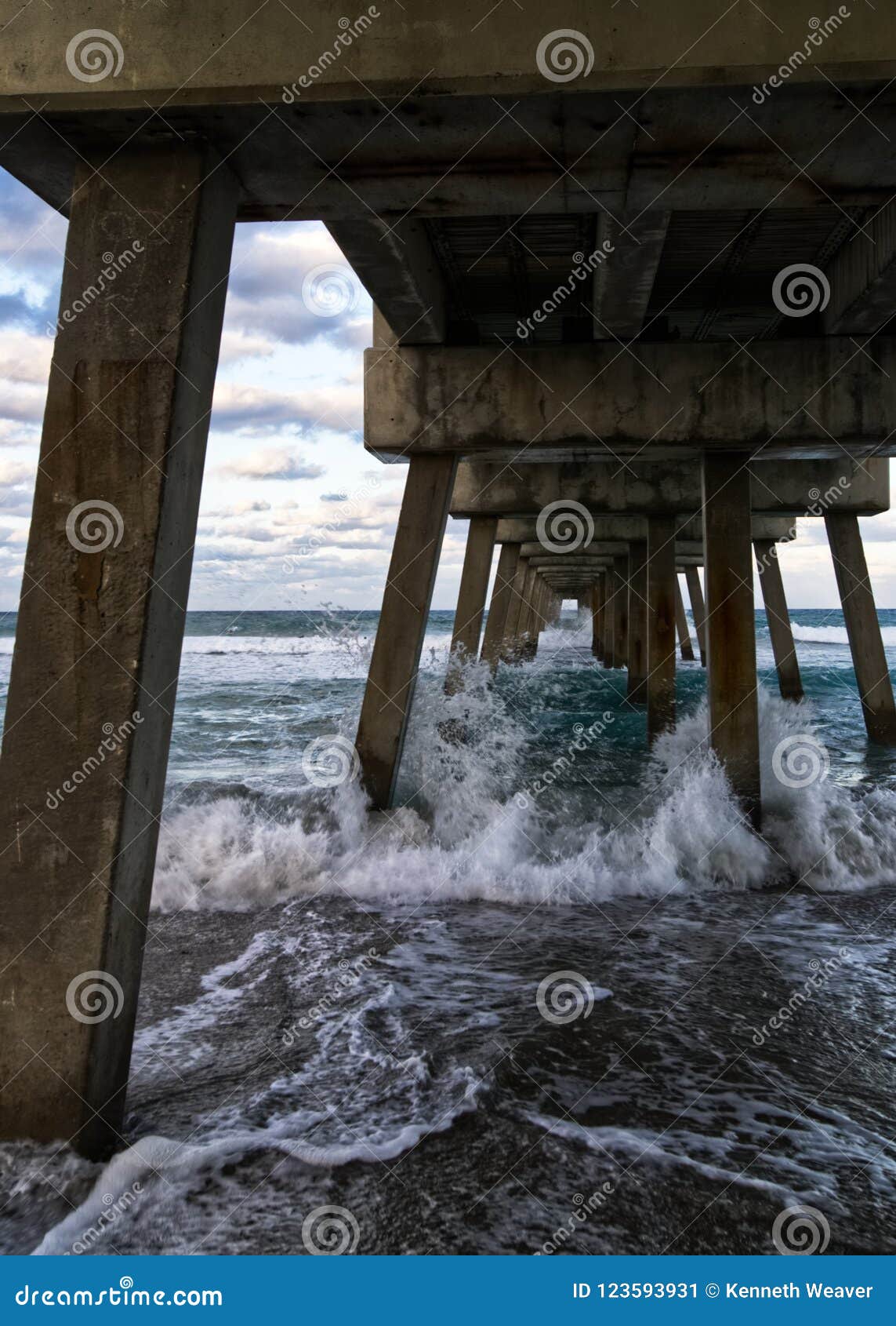 Ocean Waves Breaking Under a Concrete Pier Stock Image - Image of ...