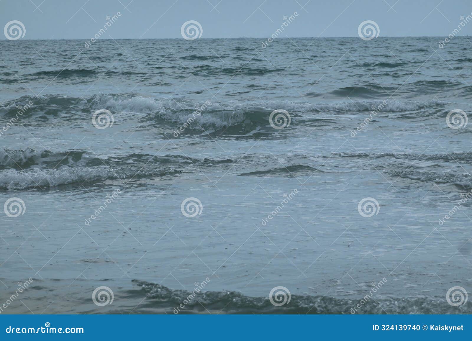 Ocean Waves Crash Onto a Sandy Beach Stock Photo - Image of outdoors ...