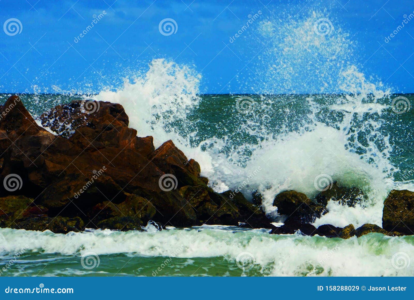 Ocean Waves Crashing on Rocks at Clearwater Beach Florida Stock Image ...
