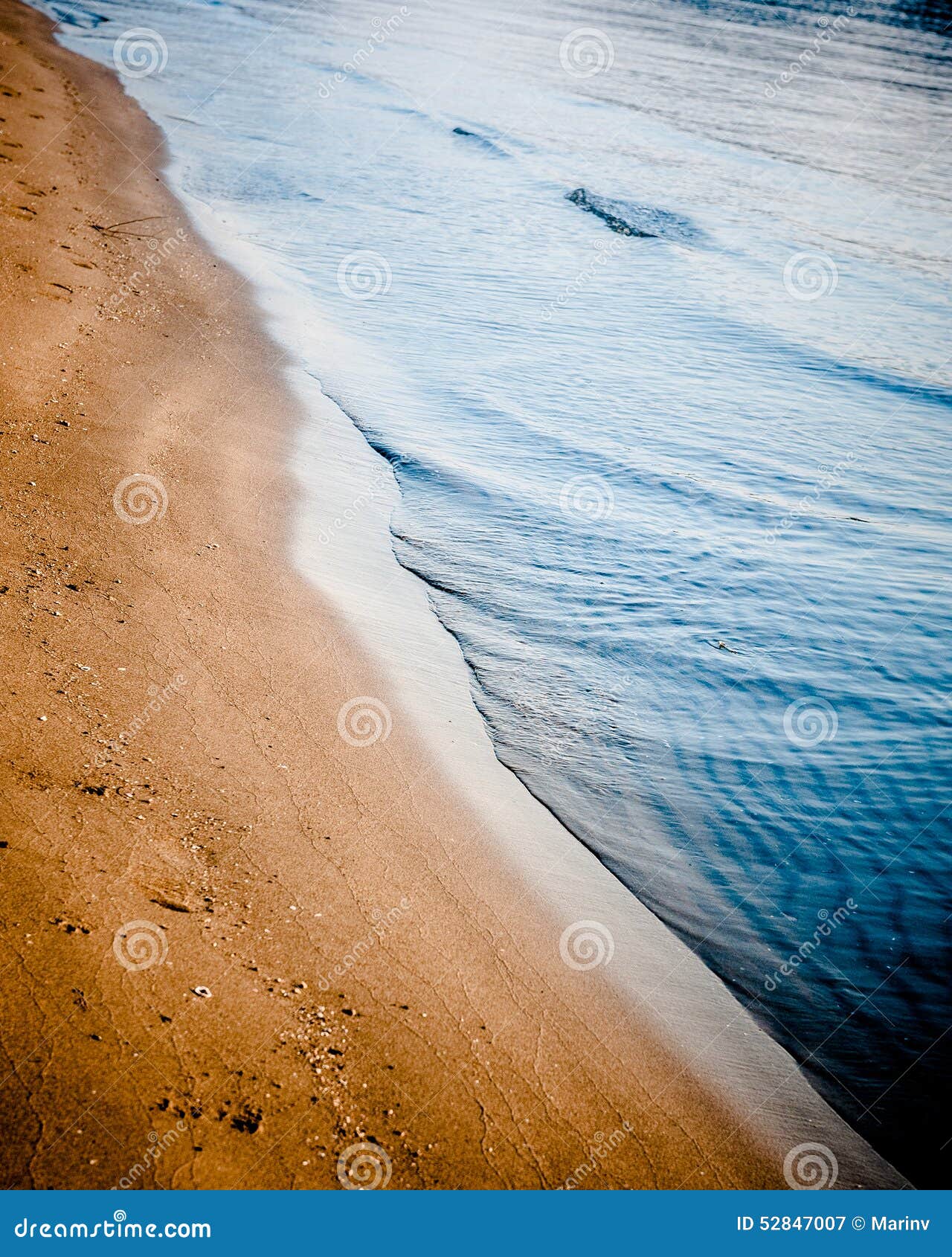 Waves Gently Hitting Fine Sand Shore. Beach Covered With Dead Algae ...