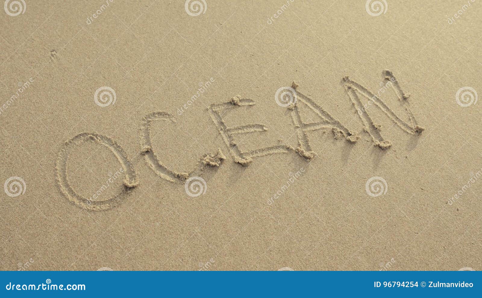 OCEAN Written on the Beach Sand Washed Aways by Waves. Stock Photo ...