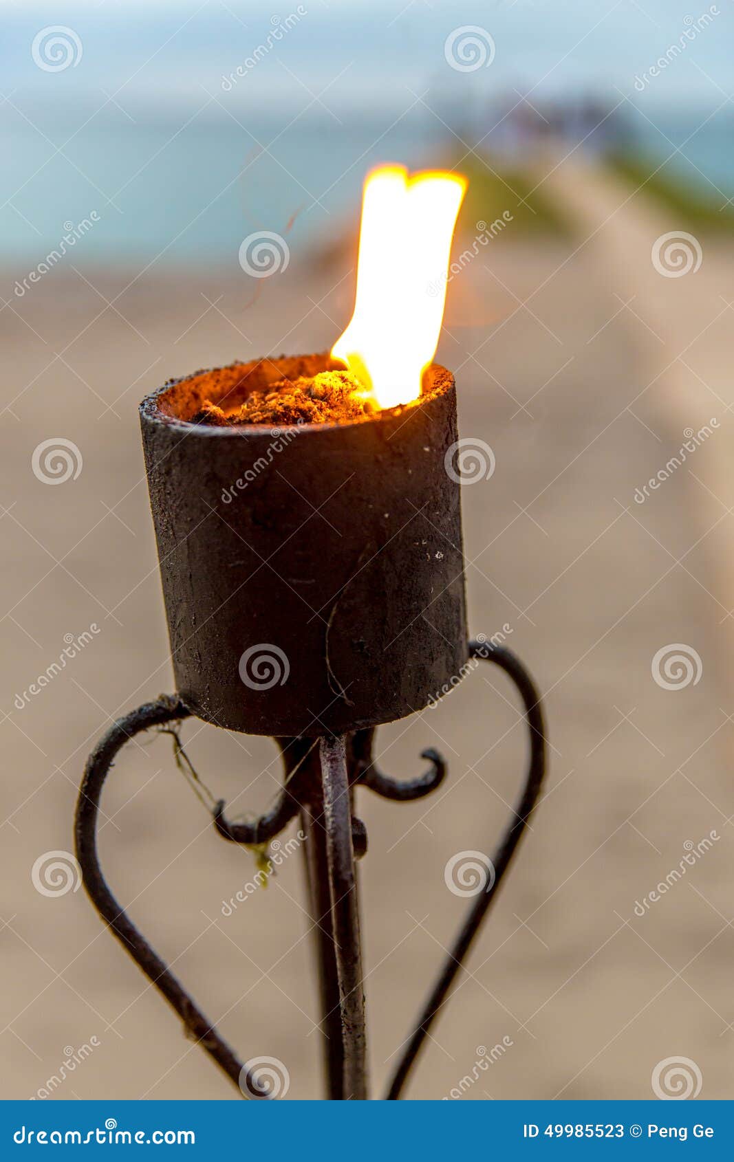 Oceanfront Wedding Torch stock image. Image of ideas - 49985523
