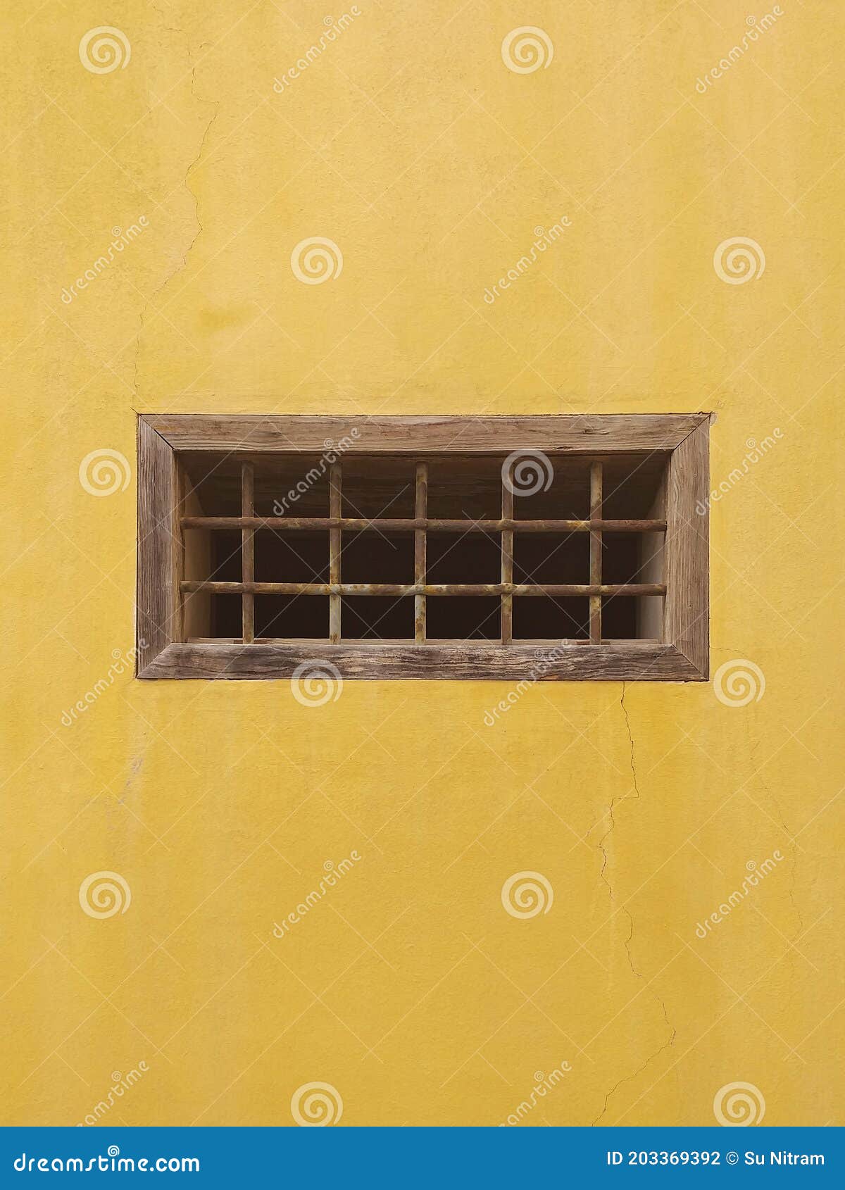 Ocher Wall with Old Small Rectangular Window with Iron Bars. Old Window ...
