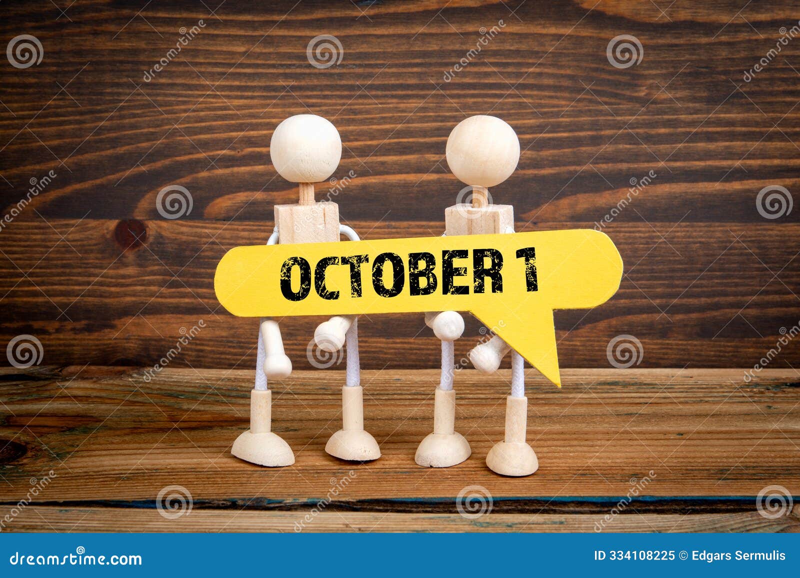 OCTOBER 1. Yellow Speech Bubble with Text on Wood Texture Background ...