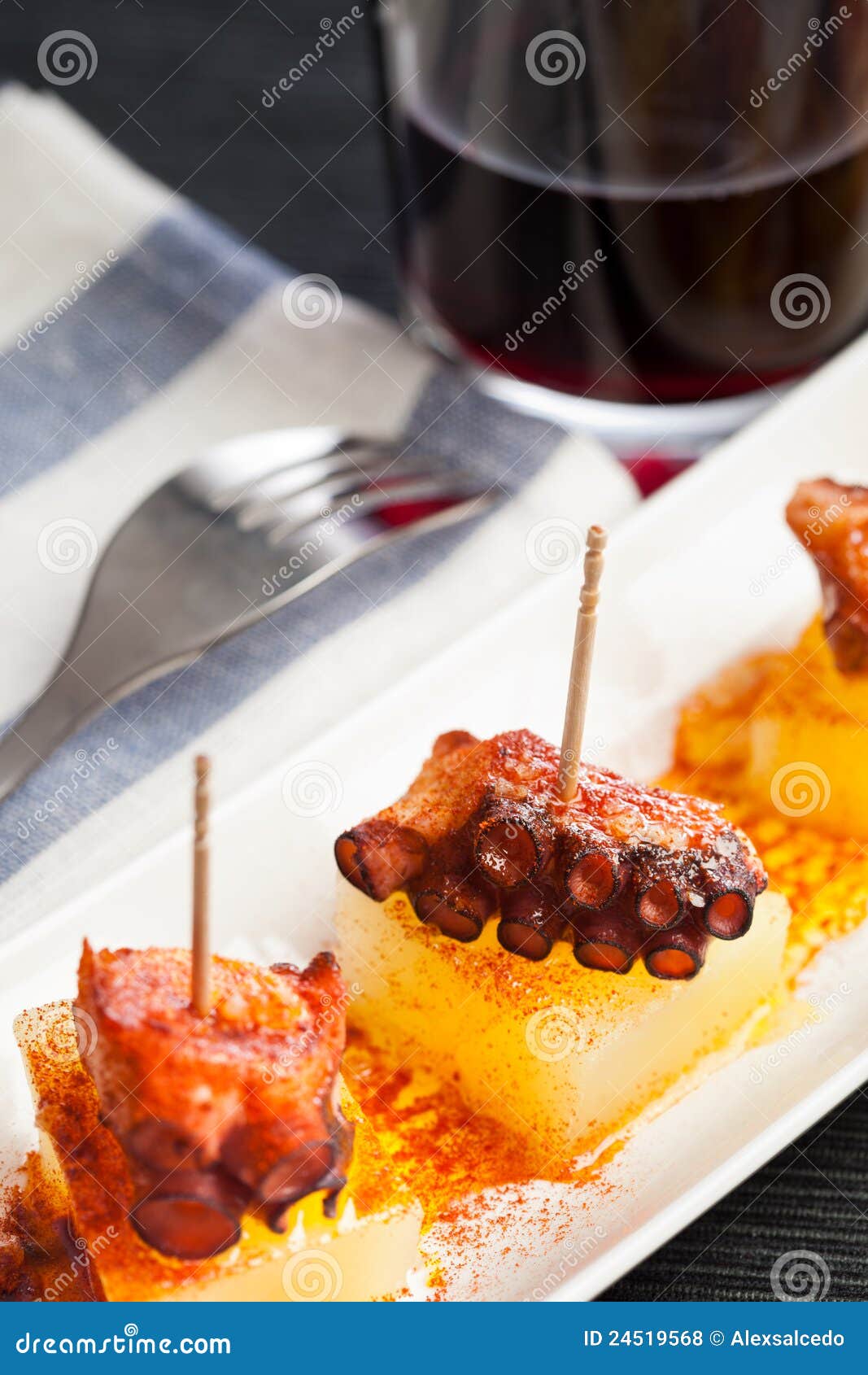 Octopus tapa with wine stock photo. Image of appetizer - 24519568