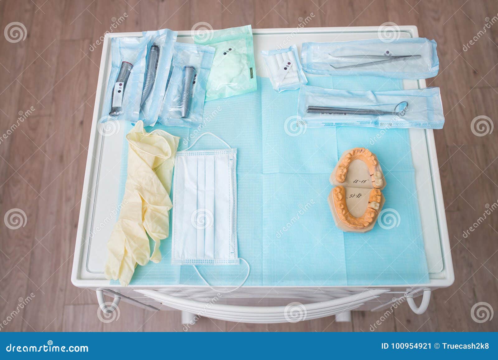 Odontological Tooth Model and Instruments at Dentist Manipulation Table ...