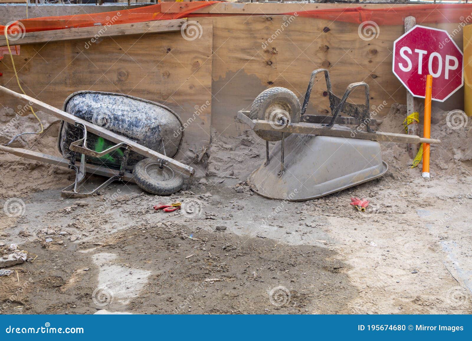 Off from Construction Work. Stop Sign Post and Two Wheel Barrels Laying ...