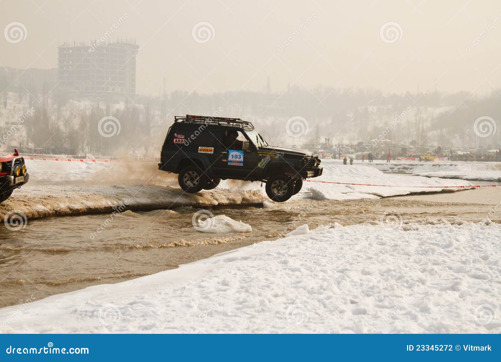 Off-road Jeeps Riding in the Mud at the Races. Editorial Photography ...