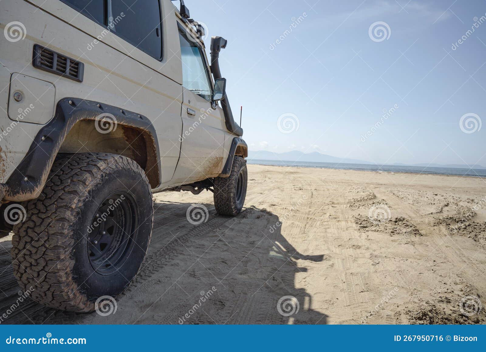 Off Road Vehicle on a Beach Stock Photo - Image of lost, freedom: 267950716