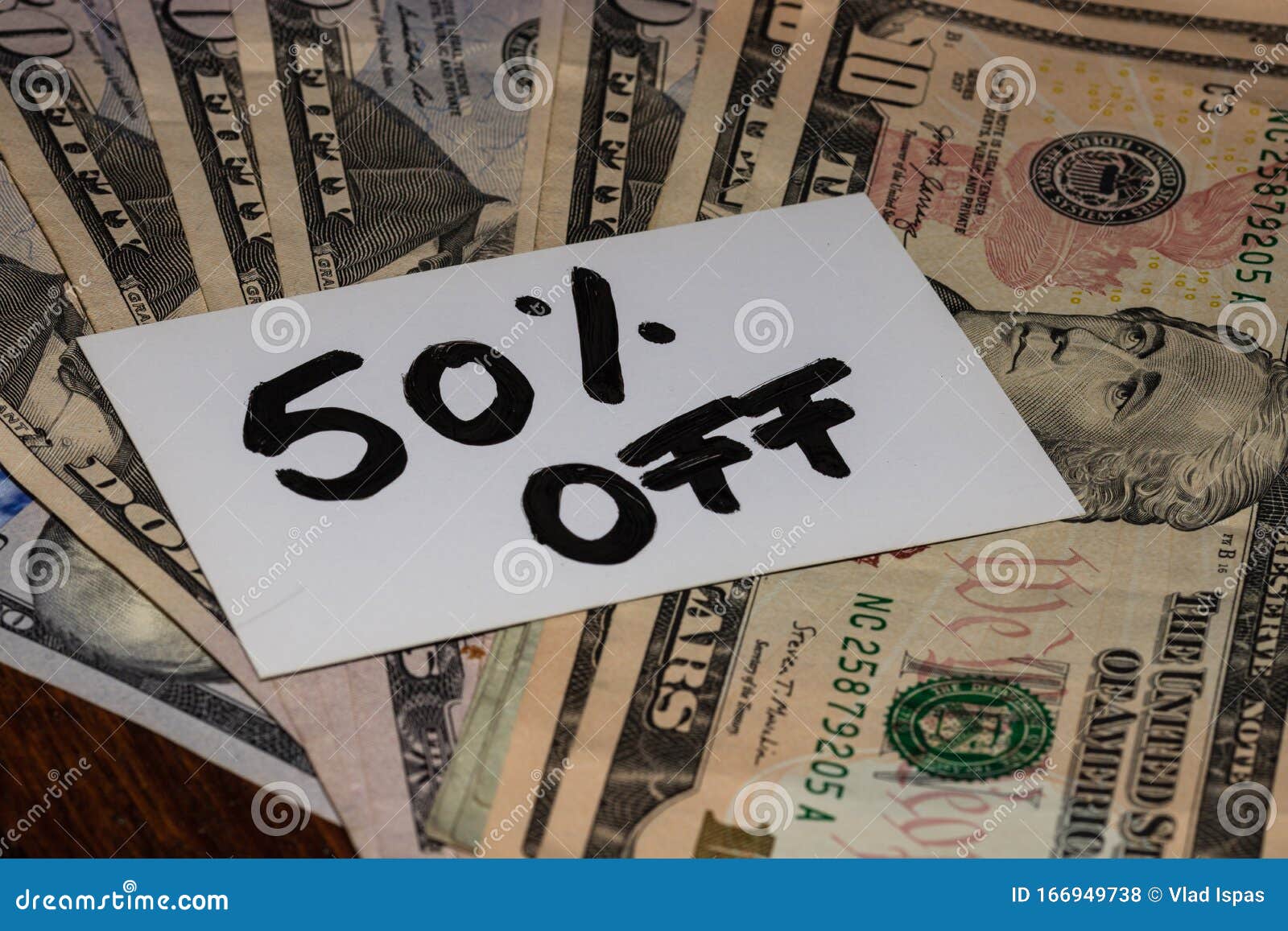 50 Off Text on White Label, Label on Dollars Money Stock Photo - Image ...