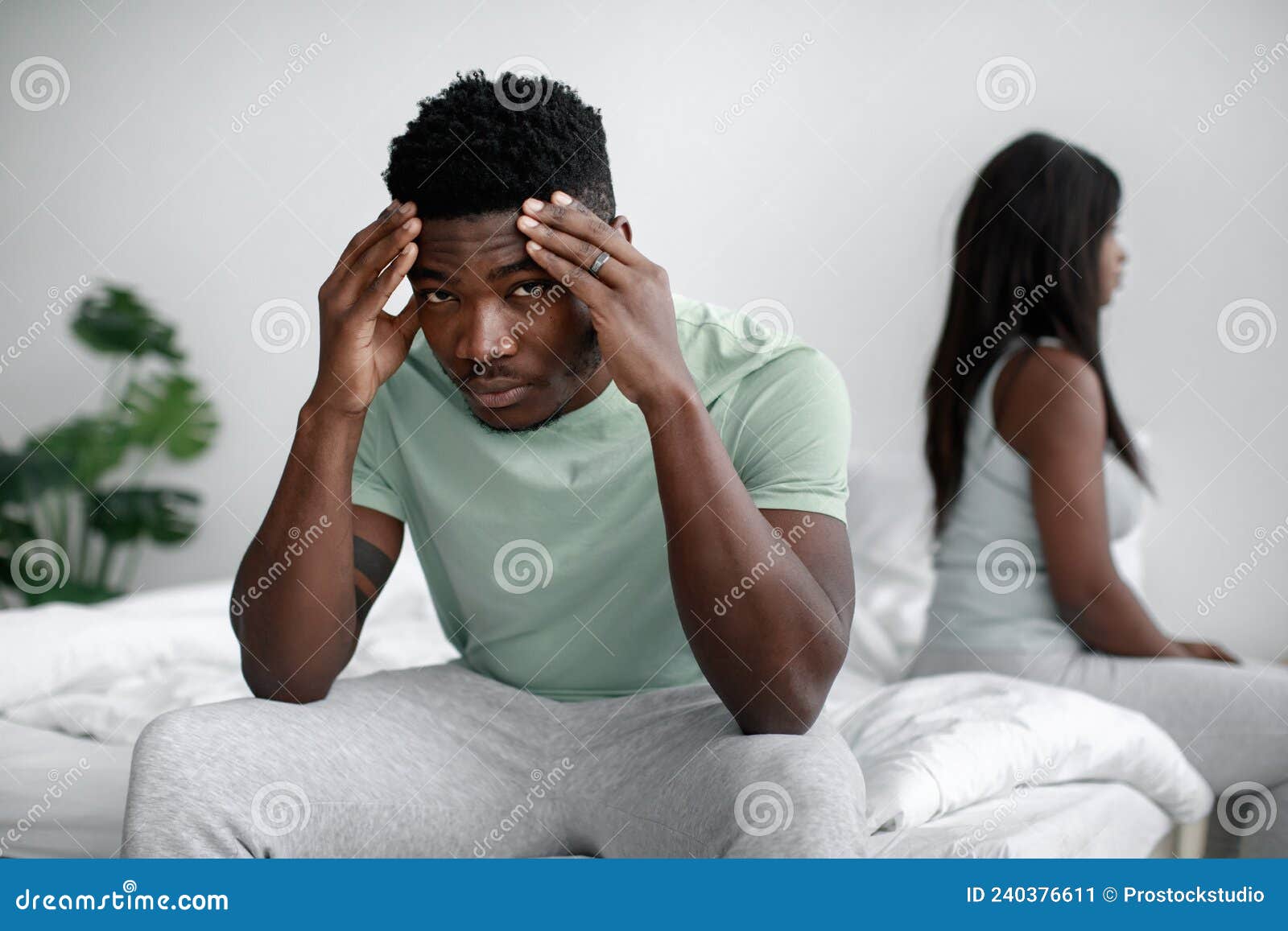 Offended Sad Young African American Husband After Quarrel Sits On Bed
