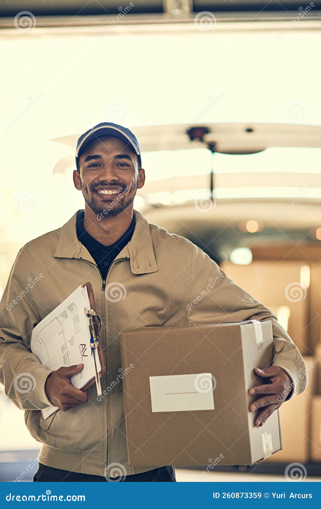We Offer Same-day Delivery for Your Convenience. Portrait of a Courier ...