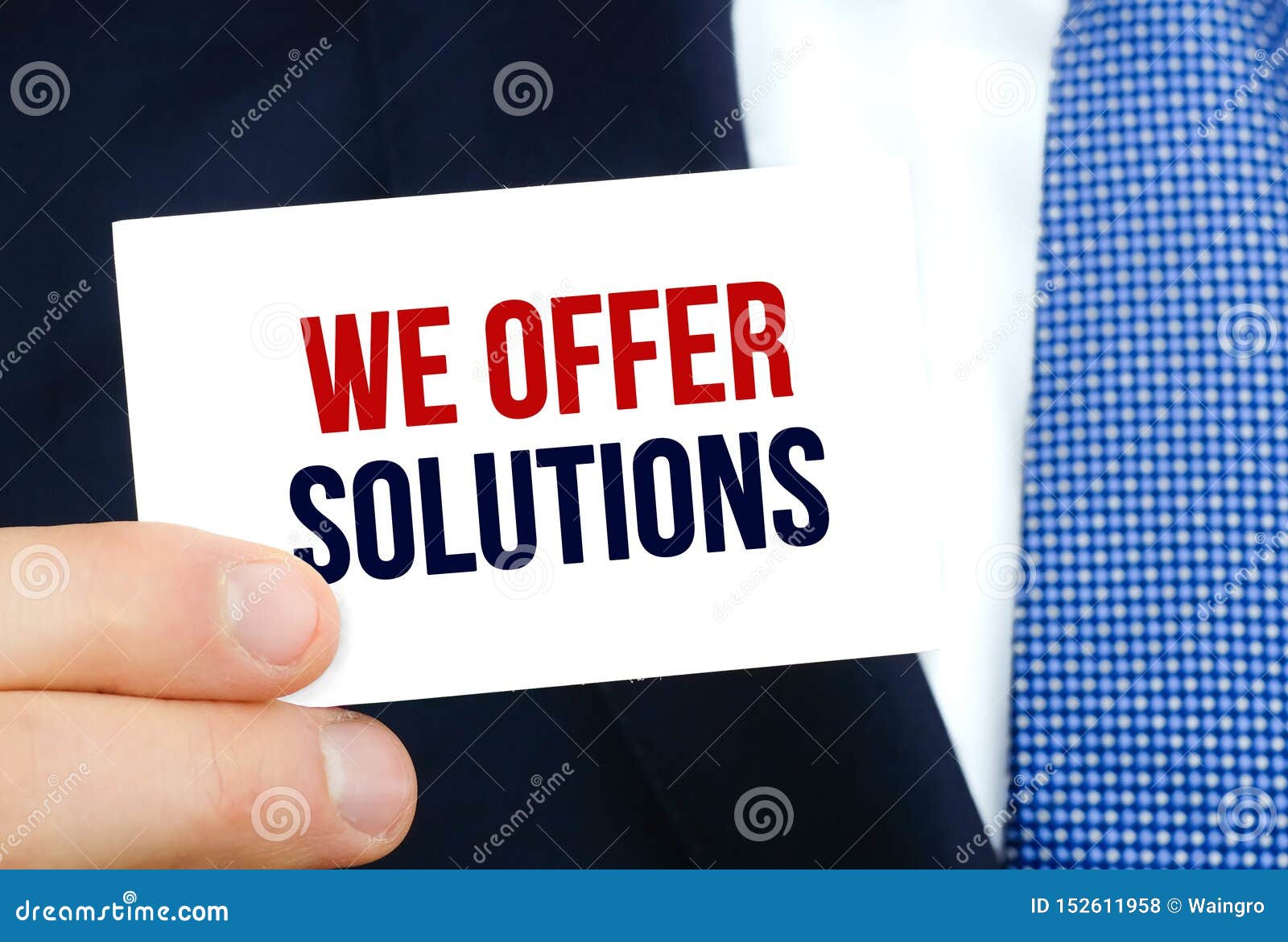 We Offer Solution - Business Man Holding Business Card Stock Photo ...