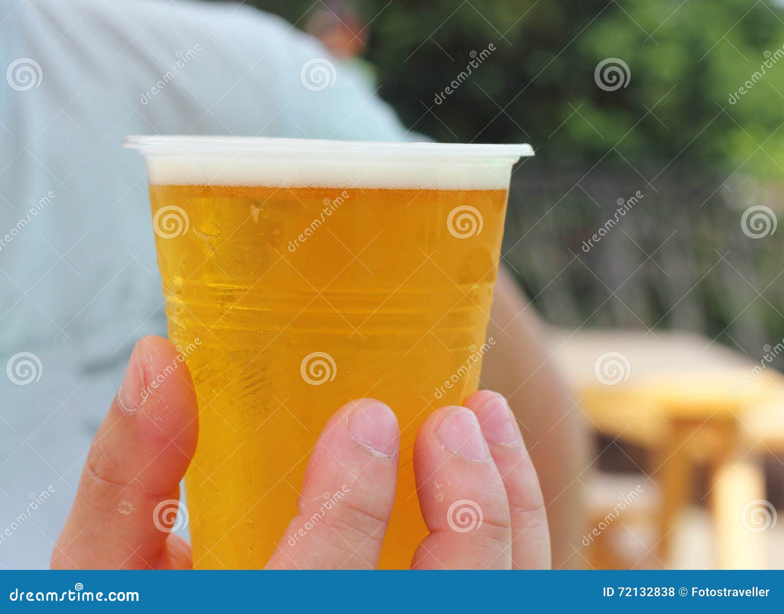 Offering a glass of beer stock photo. Image of offering - 72132838