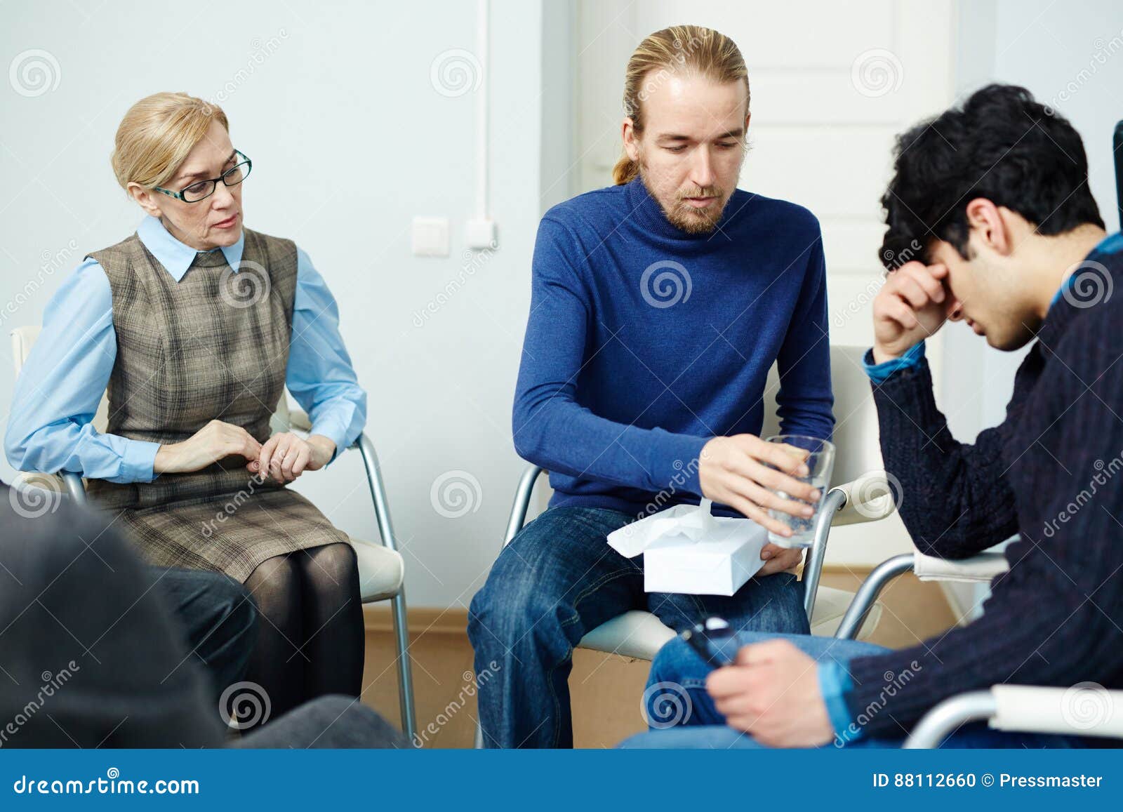 Offering Help in Group Therapy Session Stock Photo - Image of ...