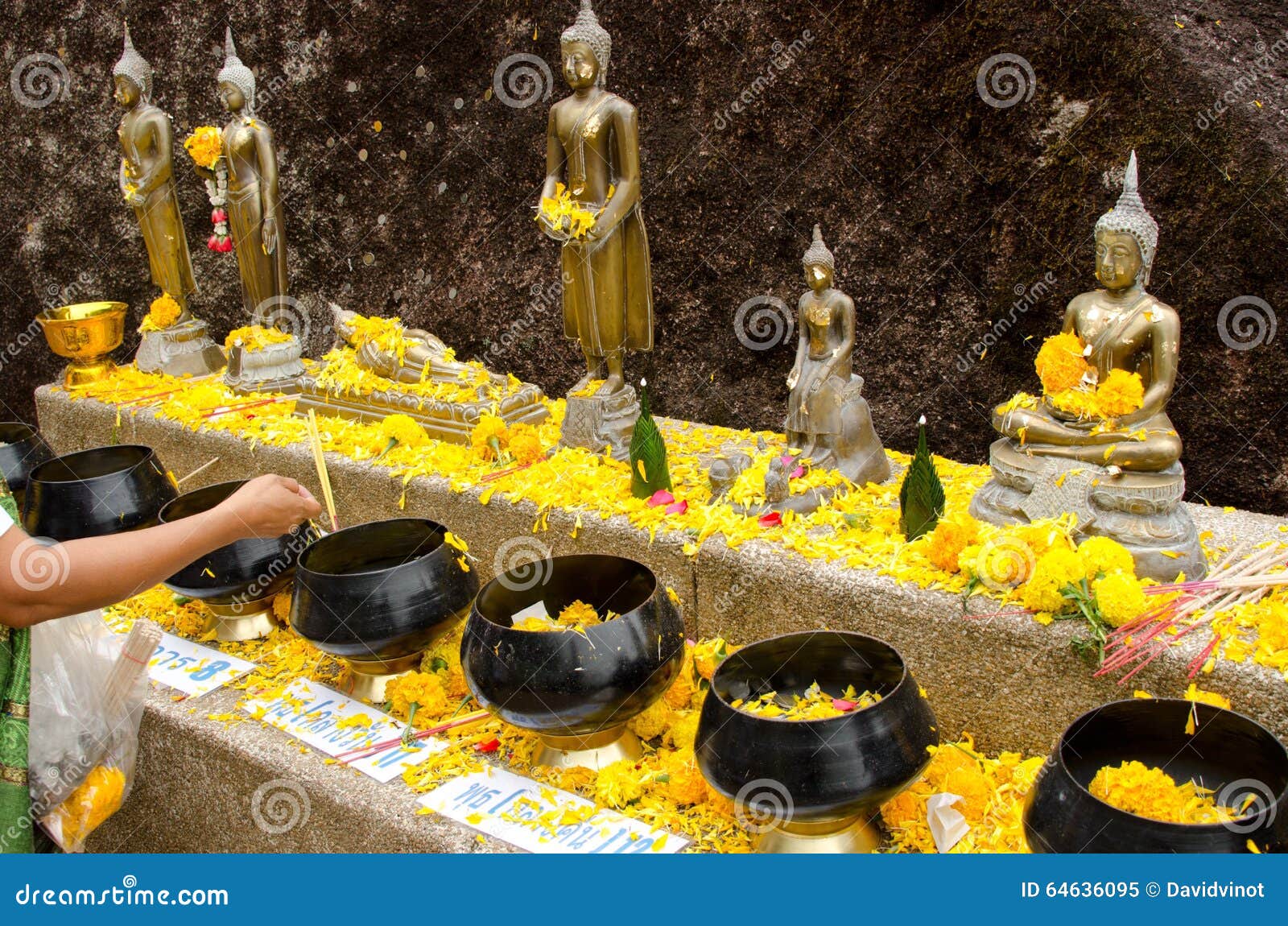Offerings at a Thai temple stock image. Image of temple - 64636095