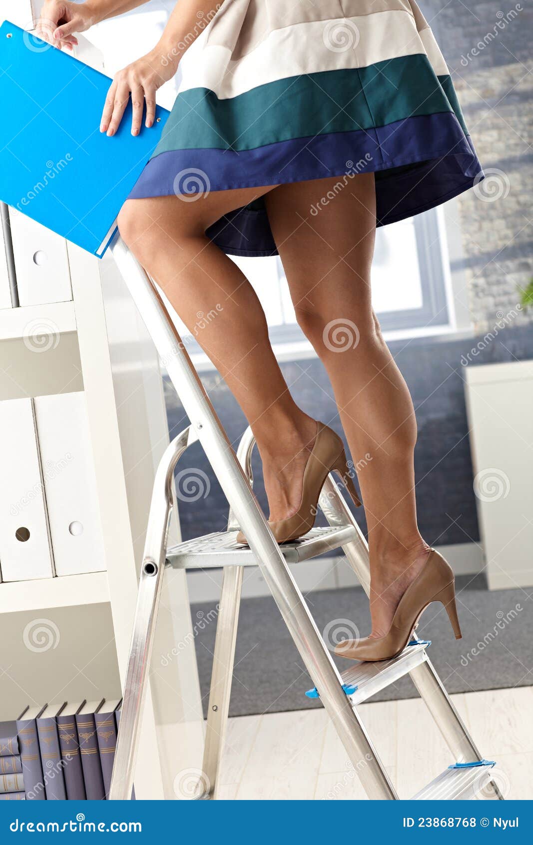 Office Assistant on Ladder with Folder Stock Photo - Image of blue ...