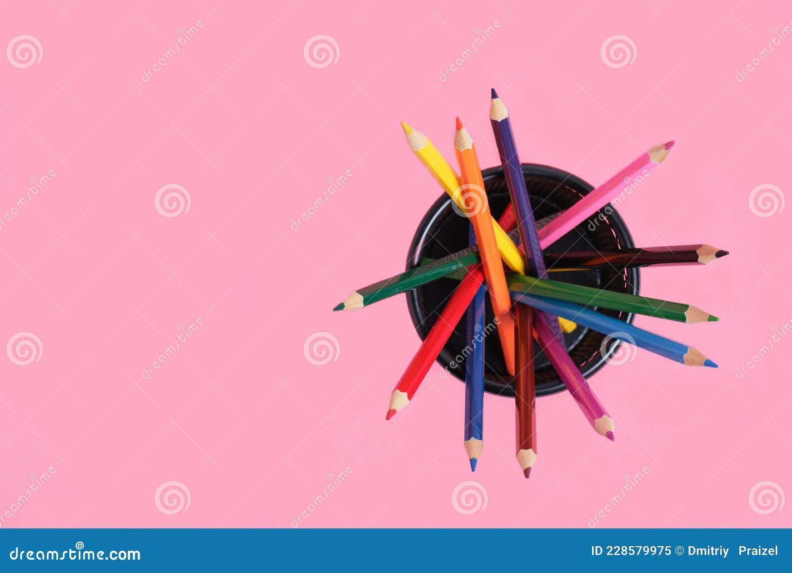 Office Basket with Colored Pencils on a Pink Background Stock Image ...