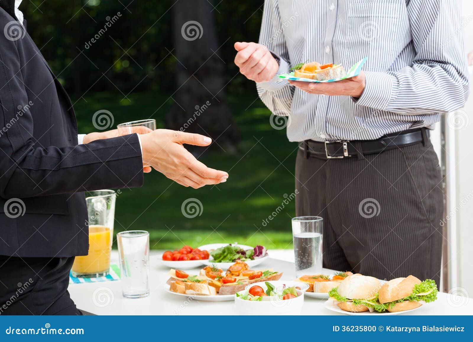 Office Buffet with Appetizers Stock Photo - Image of holding ...