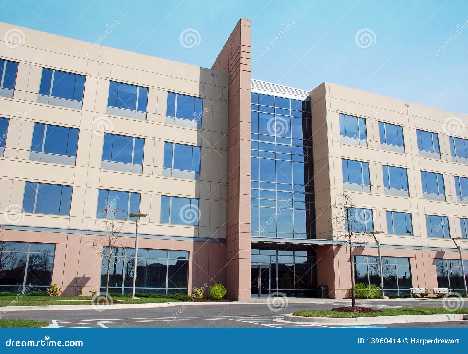 Red Stucco Office Building Facade With Windows And Metal Roof. Wooden ...