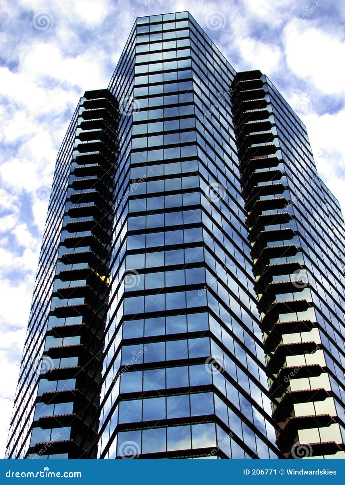 Office Building in Clouds stock image. Image of building - 206771