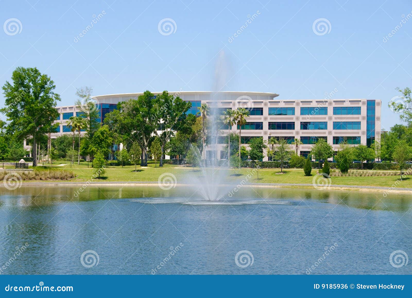 Office Building with Fountain Stock Photo - Image of glass, landscaping ...
