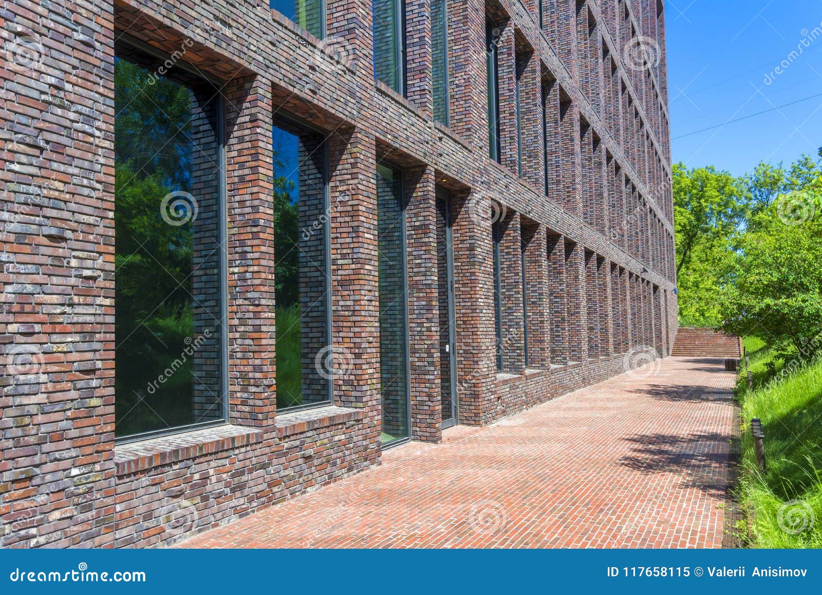 Office Building Made of Brick with Large Windows. Decorative Masonry ...