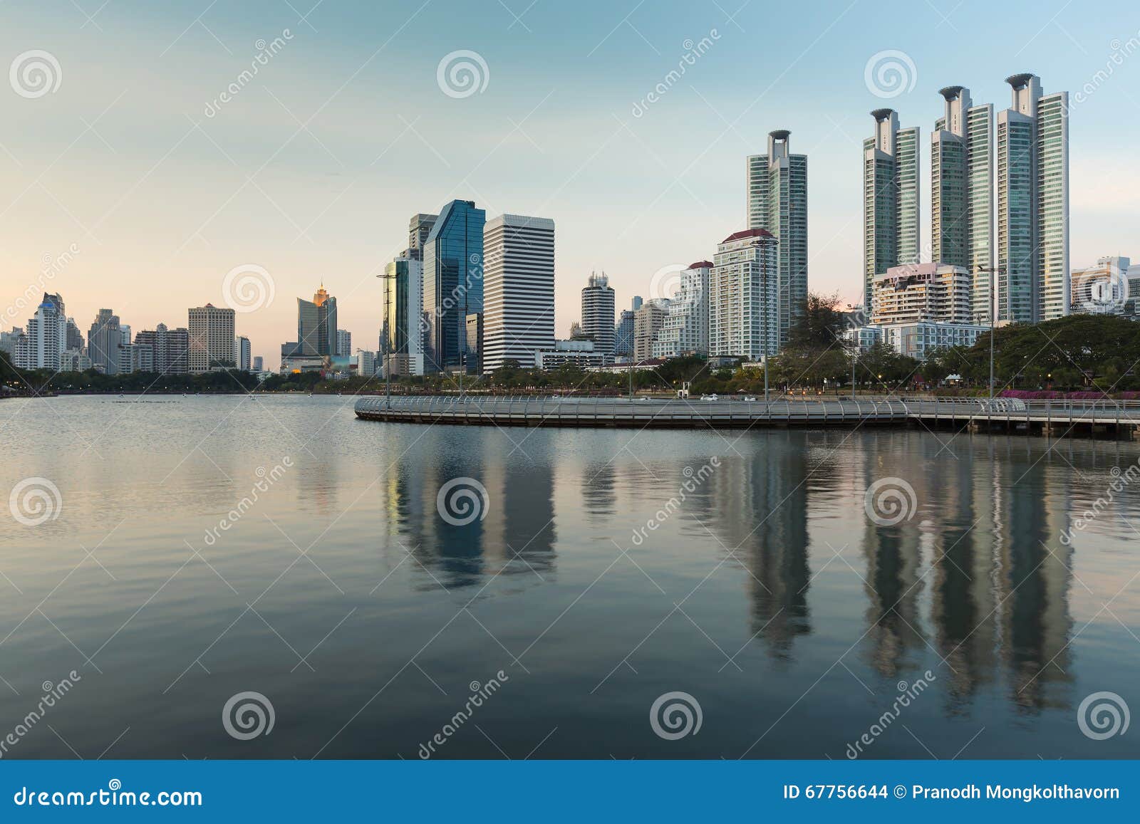 Office Building with Water Reflection after Sunset Stock Photo - Image ...