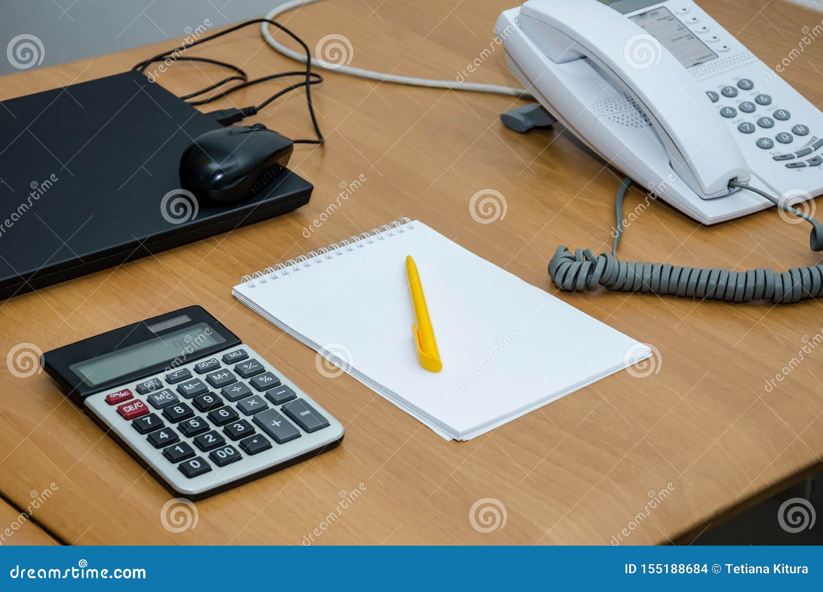 Office Concept. Notebook, Pen, Calculator, Laptop and Office Phone on ... Office Concept. Notebook, Pen, Calculator, Laptop and Office Phone on ...