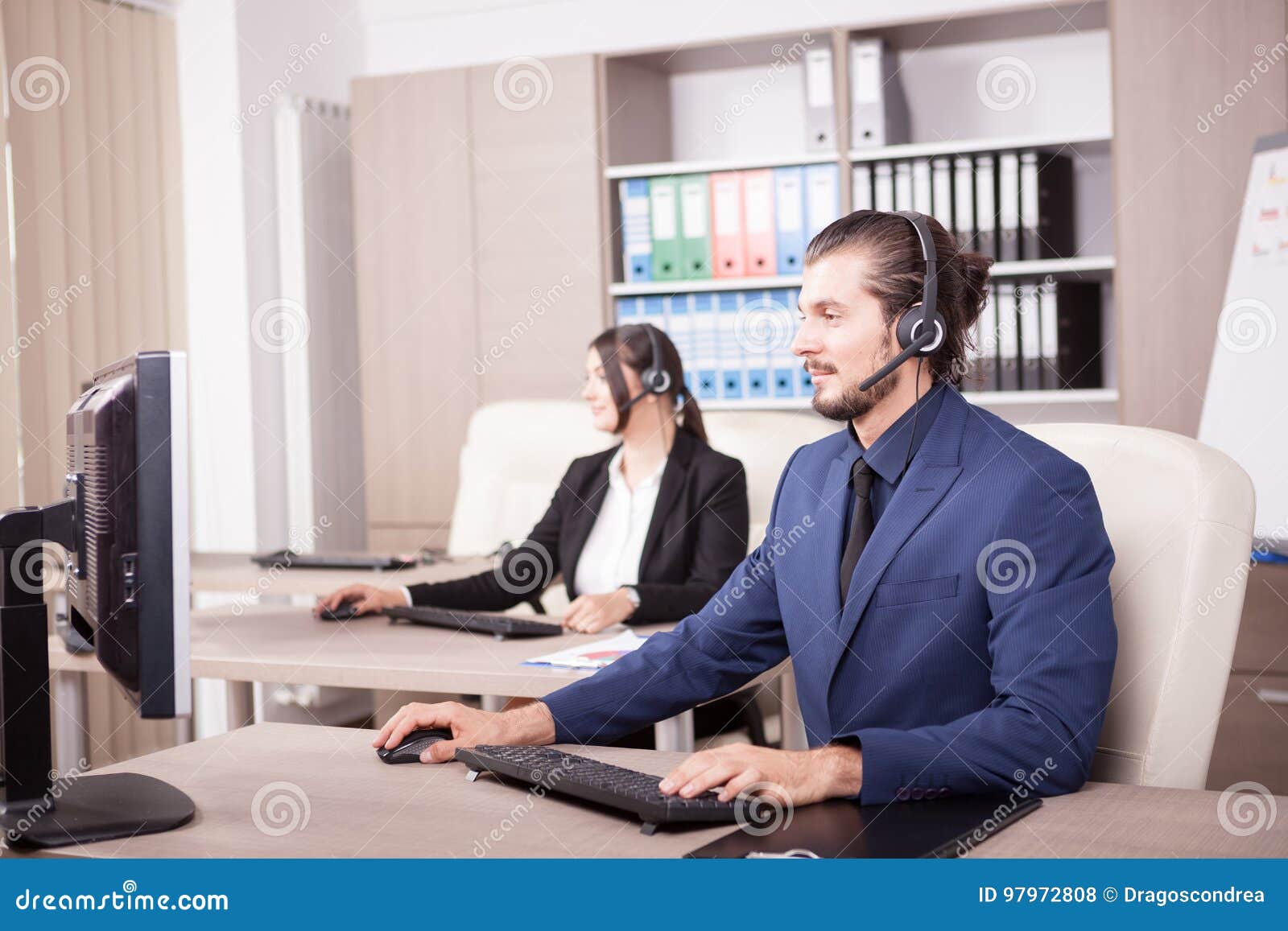 Office of Customer Support Line with People Working in it Stock Photo ...