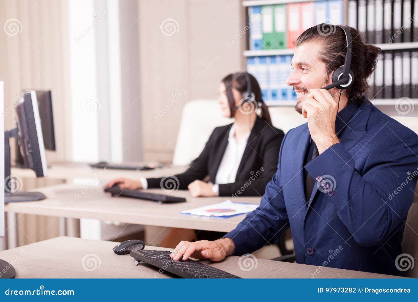 Office of Customer Support Line with People Working in it Stock Photo ...