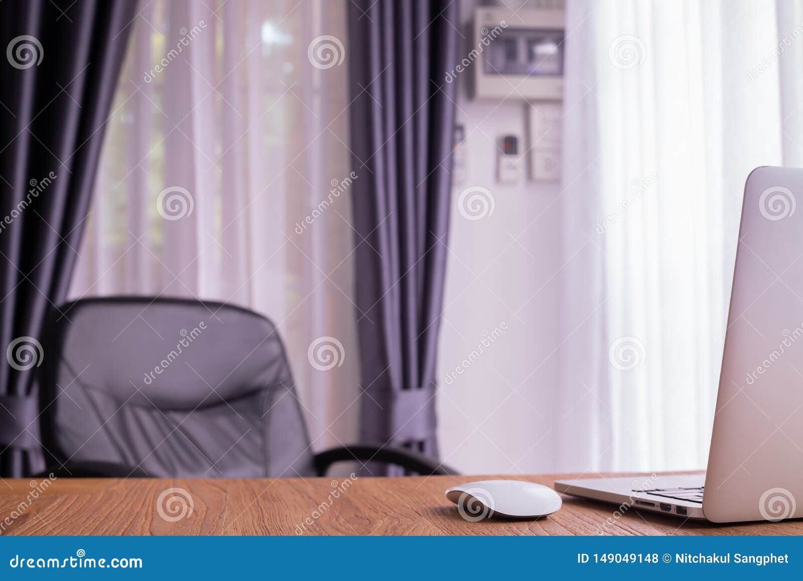 Office Desk with Back of Laptop, Notebook in Room Stock Photo - Image ...