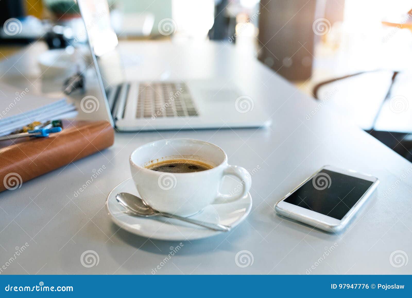 Office Desk with Coffee Cup, Smartphone and Laptop. Stock Photo - Image ...