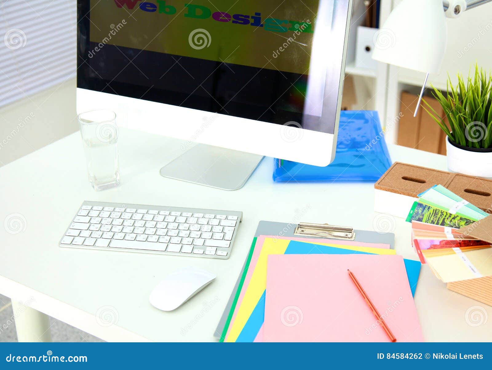 Office Desk with a Computer in the Foreground Stock Photo - Image of ...