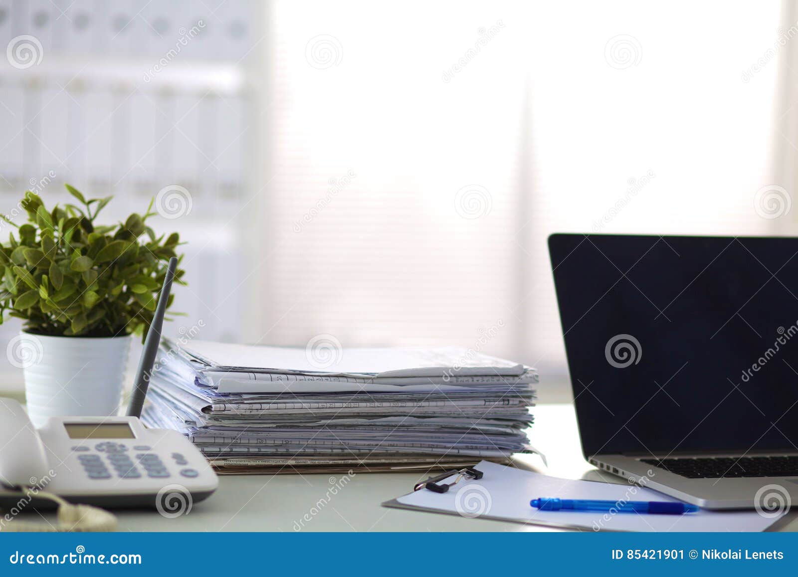 Office Desk with a Computer and Stack of Papers Stock Image - Image of ...