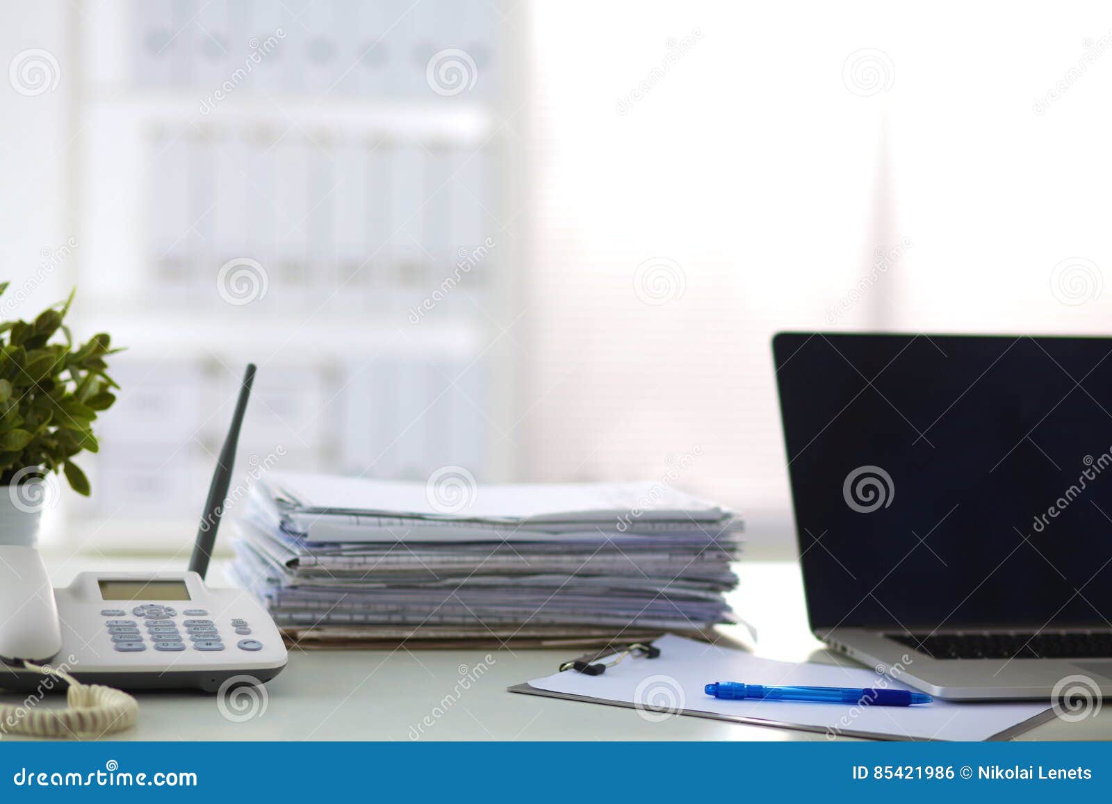 Office Desk with a Computer and Stack of Papers Stock Photo - Image of ...