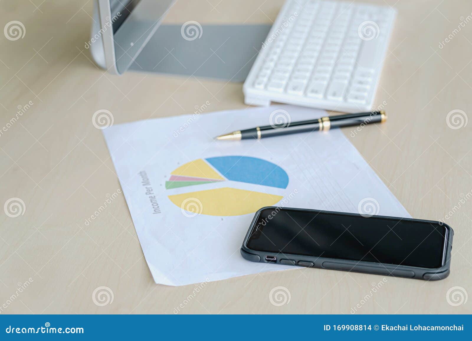 Office Desk Monitors Keyboards Mobile and the Different Graphs on Paper ...