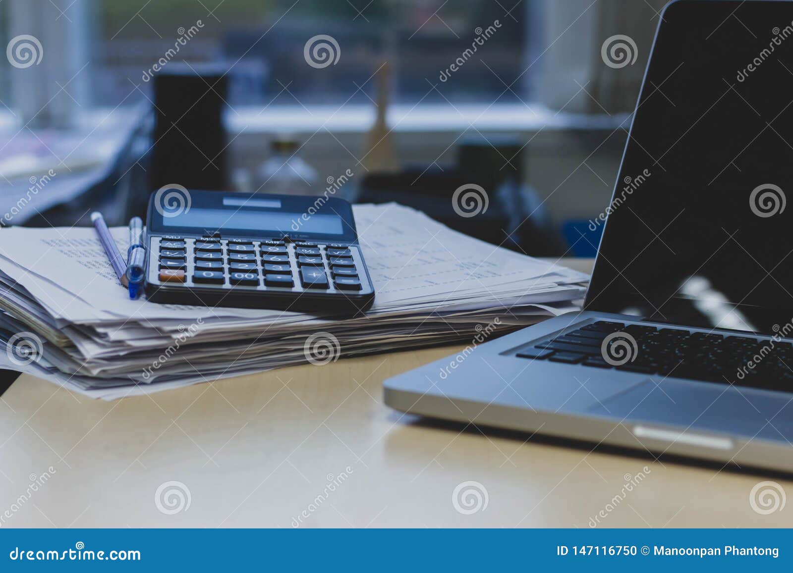 Office Desk a Stack Paper Reports and Computer Laptop Stock Photo ...