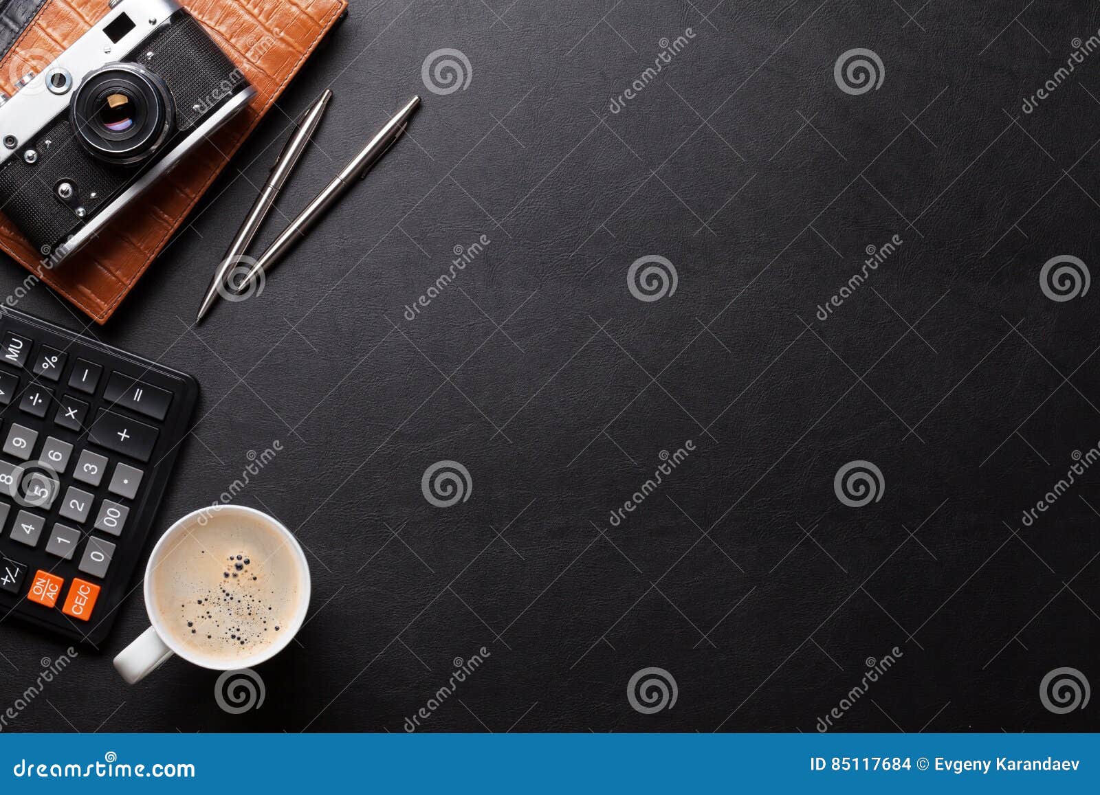 Office Desk Table with Camera, Supplies and Coffee Stock Photo - Image ...