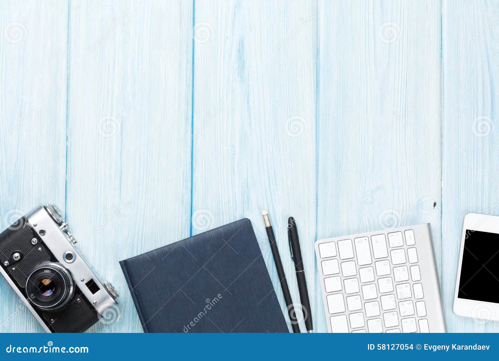 Office Desk Table with Computer, Supplies and Camera Stock Photo ...