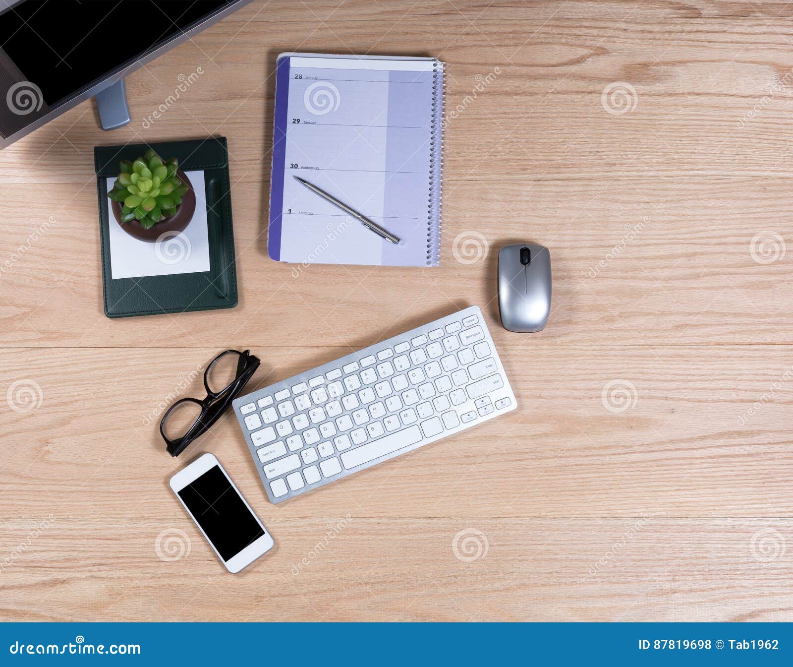 Office Desktop with Simple Work Items in Overhead View on Red Oak Wood ...